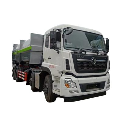 China Swing Removable Hook Roll Arm Skip Loader Compactor Garbage Truck with Manual Transmission Type for sale