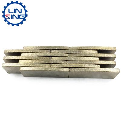 中国 快速切断と長寿 40mm オマンの砂漠 黄色の大理石 リンクシング ダイヤモンドセグメント 販売のため