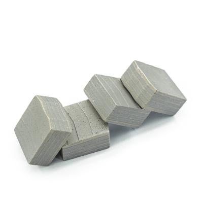 China Tecnologia de sinterização 24*11,5/12,7*26,5 mm Segmento de diamante em forma de ventoinha para corte de granito à venda