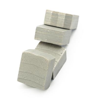 China Tecnologia de sinterização 24*11,5/12,7*26,5 mm Segmento de diamante em forma de ventoinha para corte de granito à venda