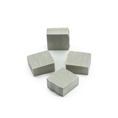 China Tecnologia de sinterização 24*11,5/12,7*26,5 mm Segmento de diamante em forma de ventoinha para corte de granito à venda