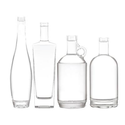 中国 スーパーフリントガラス素材 600ml カスタムデザインとロゴ印刷のためのガラス酒瓶 販売のため