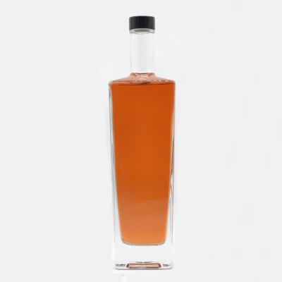 Cina Materiale in vetro di alta pietra 700ml 750ml rum vodka whisky tequila bottiglia di vetro con sughero in vendita