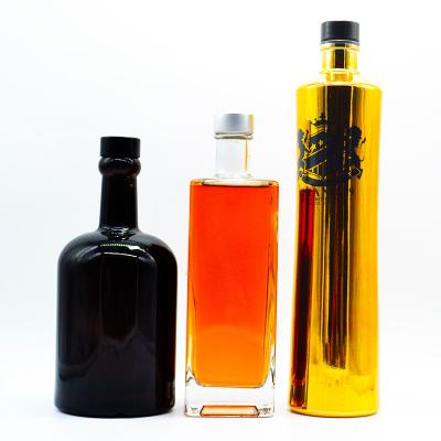 China 250 ml 375 ml 500 ml 700 ml 750 ml lege glazen drankflessen met deksel en schermdruk Te koop