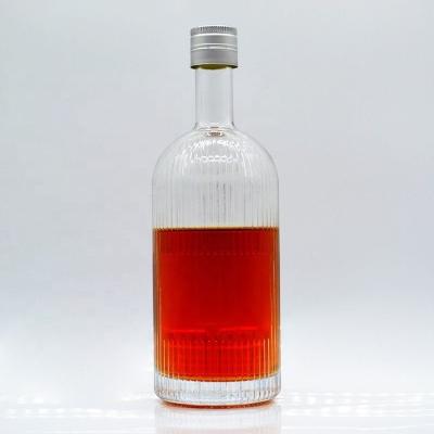 Cina Tequila personalizzata vuota in vetro alto rotondo bottiglia di gin Boston con sughero / tappi in vendita