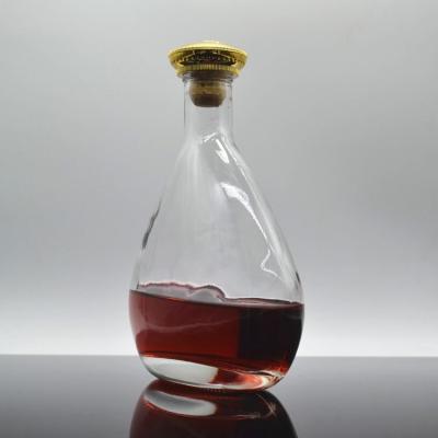 Cina Bottiglie rotonde di vetro Super Flint per whisky in liquori in vendita