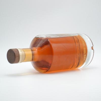 Cina 750 ml di whisky vuoto extra flint vodka bottiglia di vetro rotonda per bevande in vendita