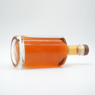 Cina 750 ml di whisky vuoto extra flint vodka bottiglia di vetro rotonda per bevande in vendita