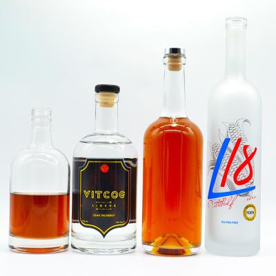 Cina 750 ml di whisky vuoto extra flint vodka bottiglia di vetro rotonda per bevande in vendita