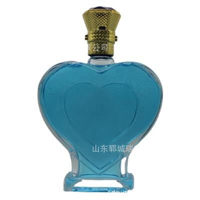 Cina Bottiglia di cristallo bianco di vetro per bevande di design elegante 500ml 750ml Vodka Whiskey Brandy in vendita