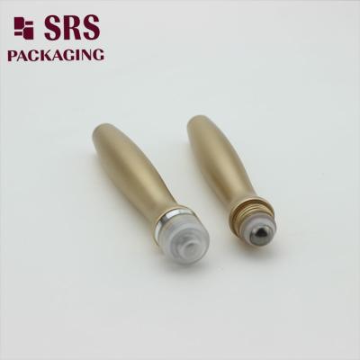 China SRS packaging empty plastic eye cream gold color 15ml roll on bottle à venda