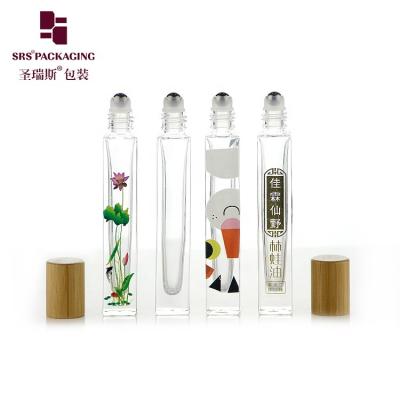 China 10ml High End Empty Square Glass Roll On Bottle with Bamboo Wooden Cap and 3D Printing Logo Service for Perfume Oil Serum for sale