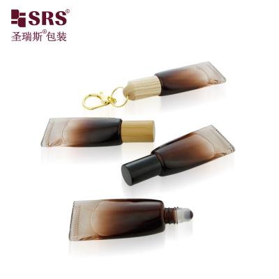 China Wholesale Light Resistant Brown Gradient Coating Colored Glass Vial Container With Stone Roller Ball For Perfume With Keychain 10ml for sale