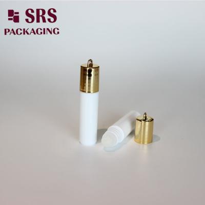 China SRS empty cosmetic 5ml plastic perfume roll on bottle with gold hook cap for sale