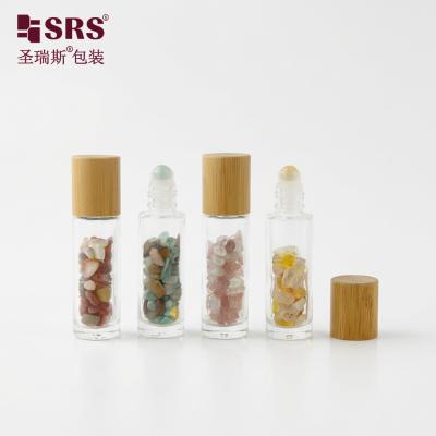 China BLPM-15ML Clear Glass Roll on Bottle Bamboo Cap Natural Crystal Gravel Essential Oil Perfume Cosmetic Roller Container for sale