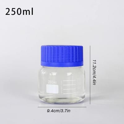 China Grote mond gegradueerde ronde reagensmedia/opslaglaboratorium glasflesset met GL80 blauwe polypropyleen schroefkappen Te koop