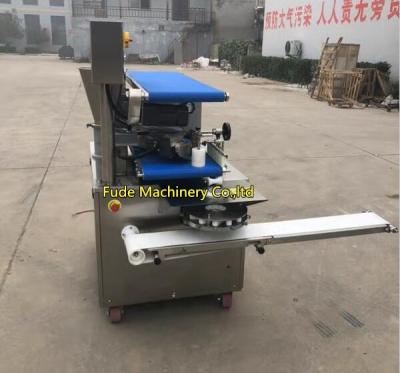 China Automatic baozi machine, steamed bun machine, pie cake machine, momo machine for sale