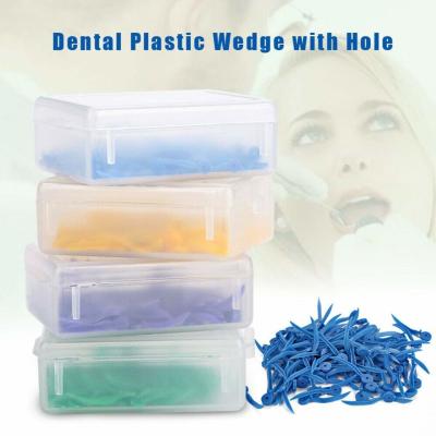Cina SJ Disposable Colorful Dental Wedge Plastic Teeth Wedges Price for Dental Clinic Use in vendita