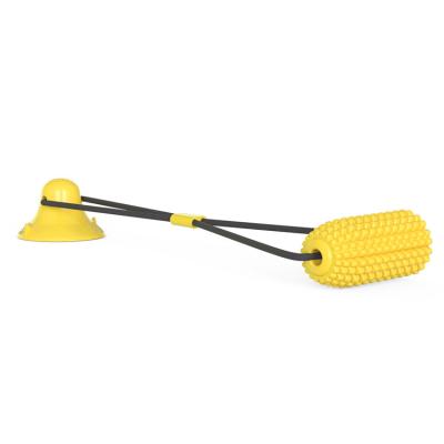 Cina Durable Bite Resistant Dog Tug Pull Rope Toy Corn Suction Cup Puppy Toys Dogs Supplies Pet Molar Ball New Material Toothbrush in vendita
