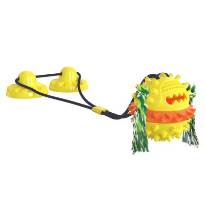 Cina Multifunctional Interactive Pet Leak Food Toys Strong Pet Molar Chew Toy Ball With Double Suction Cups in vendita