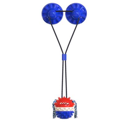 Cina Multifunctional Interactive Pet Leak Food Toys Strong Pet Molar Chew Toy Ball With Double Suction Cups in vendita