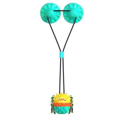 Cina Multifunctional Interactive Pet Leak Food Toys Strong Pet Molar Chew Toy Ball With Double Suction Cups in vendita