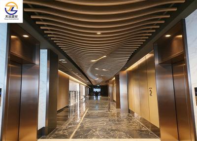 China Curved Aluminum Baffle Ceiling | Dynamic Wave Design for Luxury Elevator Lobbies for sale