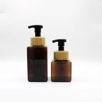 China Customized 250ml, 500ml Brown Square Bottle with Bamboo Lid Foam Lotion Pump Cosmetic Bottle for sale