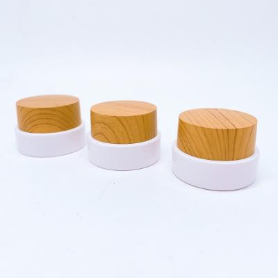 China 5ml Empty Nail Polish Bottles With Wood Grain Cap Nail Gel Jar for sale