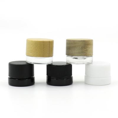 China 3.5g Glass bottle + Bamboo/PP Anti Theft Lid for sale