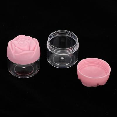 China 20g Plastic Cosmetic Cream Containers with Rose Shaped Screw Caps, Empty Makeup Sample Jars Lip Balm Pot Jar for sale