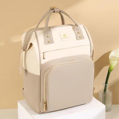 China Lightweight Multi-Functional Diaper Bag for Moms Capacity Waterproof Handheld Backpack Feature Geometric Pattern Cotton for sale