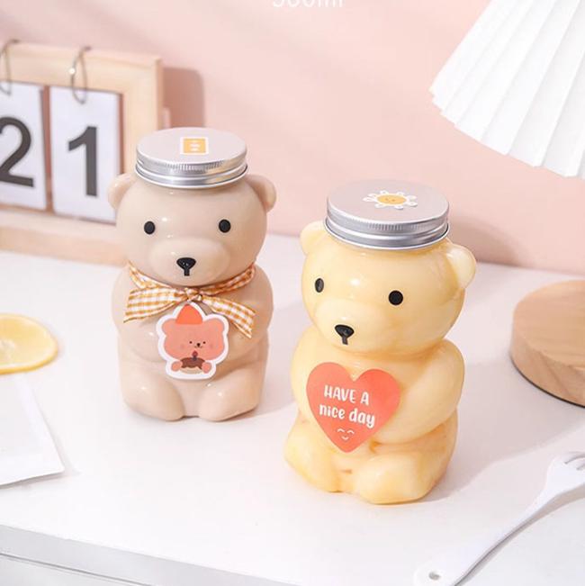 350ml 400ml 700ml Hot Selling Customize Pet Plastic Bear Shape Juice Bottle for Beverage with Cap and Straps