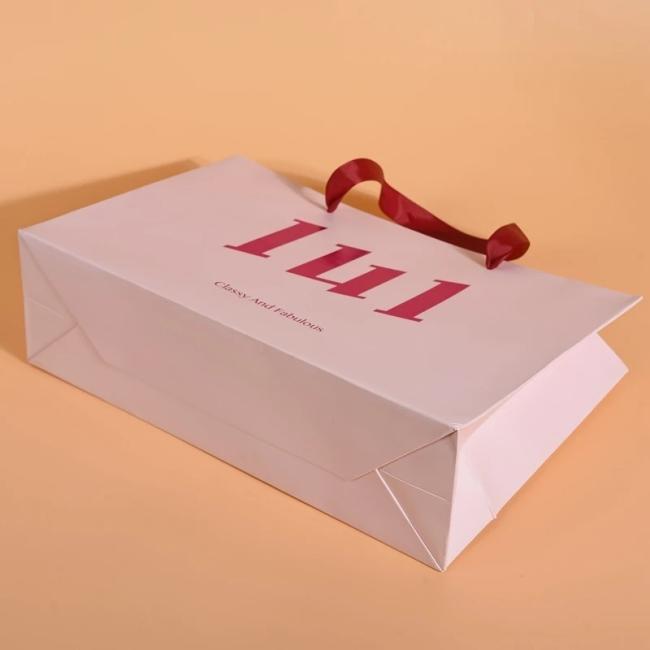 Wholesale Factory Price Luxury Eco-Friendly Paper Carrier Bag Paper Shopping Bag Gift Packaging Bag