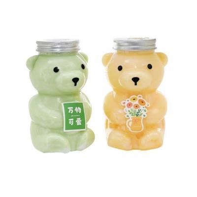 Cina Costo di spedizione Materiale di base per animali da compagnia Creativo in forma di orso Bottiglia di plastica a bolla con tappi in alluminio in vendita