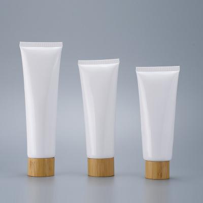Cina 50g60g80g100g120g150g Pompa cosmetica con copertura in bambù Dispositivo e serigrafia in vendita