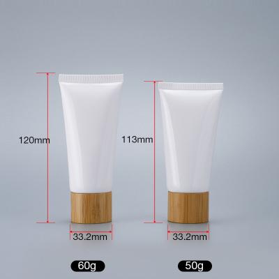 Cina 50g60g80g100g120g150g Pompa cosmetica con copertura in bambù Dispositivo e serigrafia in vendita