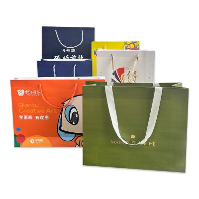 Cina Logo personalizzato di Natale Moda doppia tazza di carta ondulata regalo per regalo / shopping in vendita
