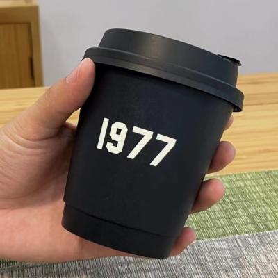 China 90 Caliber Disposable Milk Tea Cup Pure Black Double-Layer Hollow Paper Cup Custom Logo for sale