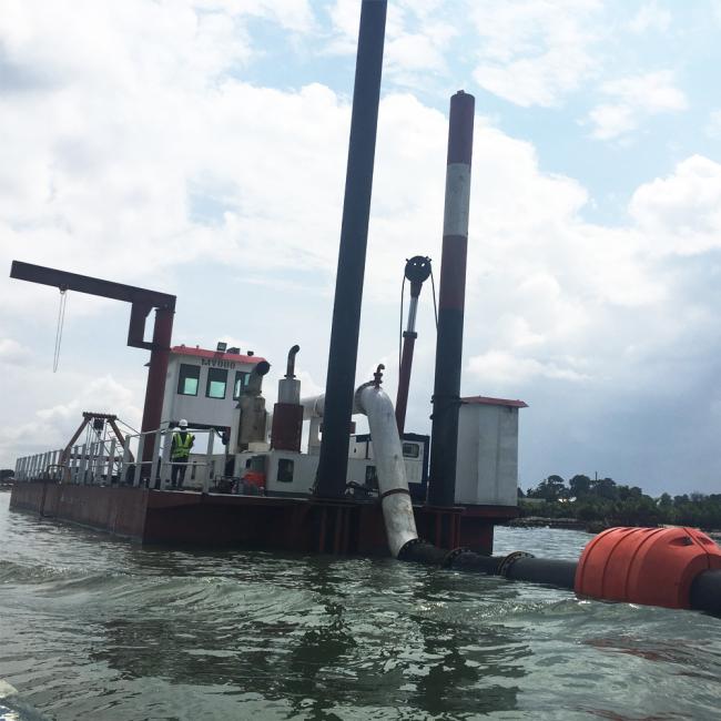 Dredger Working in River