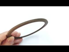 Alta precisione idraulica LUMINOSA della guarnizione dell'anello di rinforzo PTFE del cilindro idraulico dell'escavatore