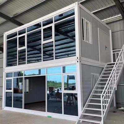 China Black Wall Material 50mm EPS/rockwool Portable Cabin Bungalow kit 20 40ft Flat Pack Container House for Living House for sale