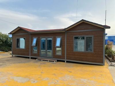 China 20 40 ft Waterproof Rock Wool Sandwich Panel Modular Durable Prefabricated Flat Pack Container House with Modern Design for sale