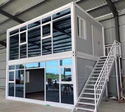 China 5.8*3m Glass Container House Rockwool Prefabricated Tiny Container Houses for Wall Material 50mm EPS/rockwool Booth for sale