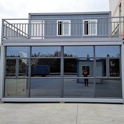 中国 PVC板床 二層モジュール型 移動式 20 40 フィート プレファブリケーション コンテナハウス ガラスカーテンとオフィス用の階段 販売のため