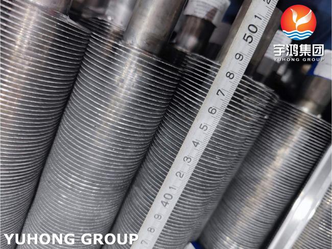 Extruded fin tube with Incoloy 825 base tube and aluminum fins showing detailed construction