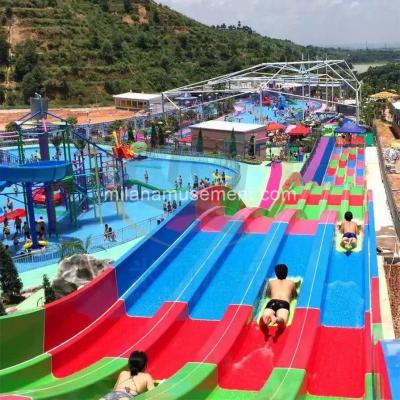 China Racing Rainbow Water Slide Fiberglass Material With High Platform for sale