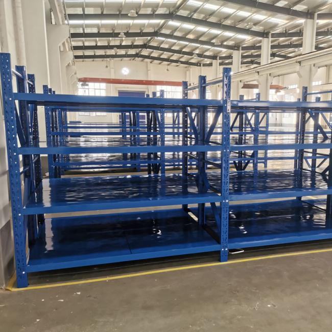 Medium duty shelving rack with laminated boards