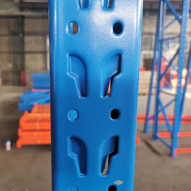 Adjustable warehouse shelving rack in industrial setting