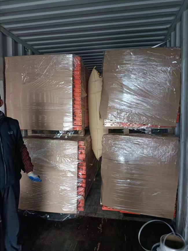 Shelving unit loaded with warehouse inventory